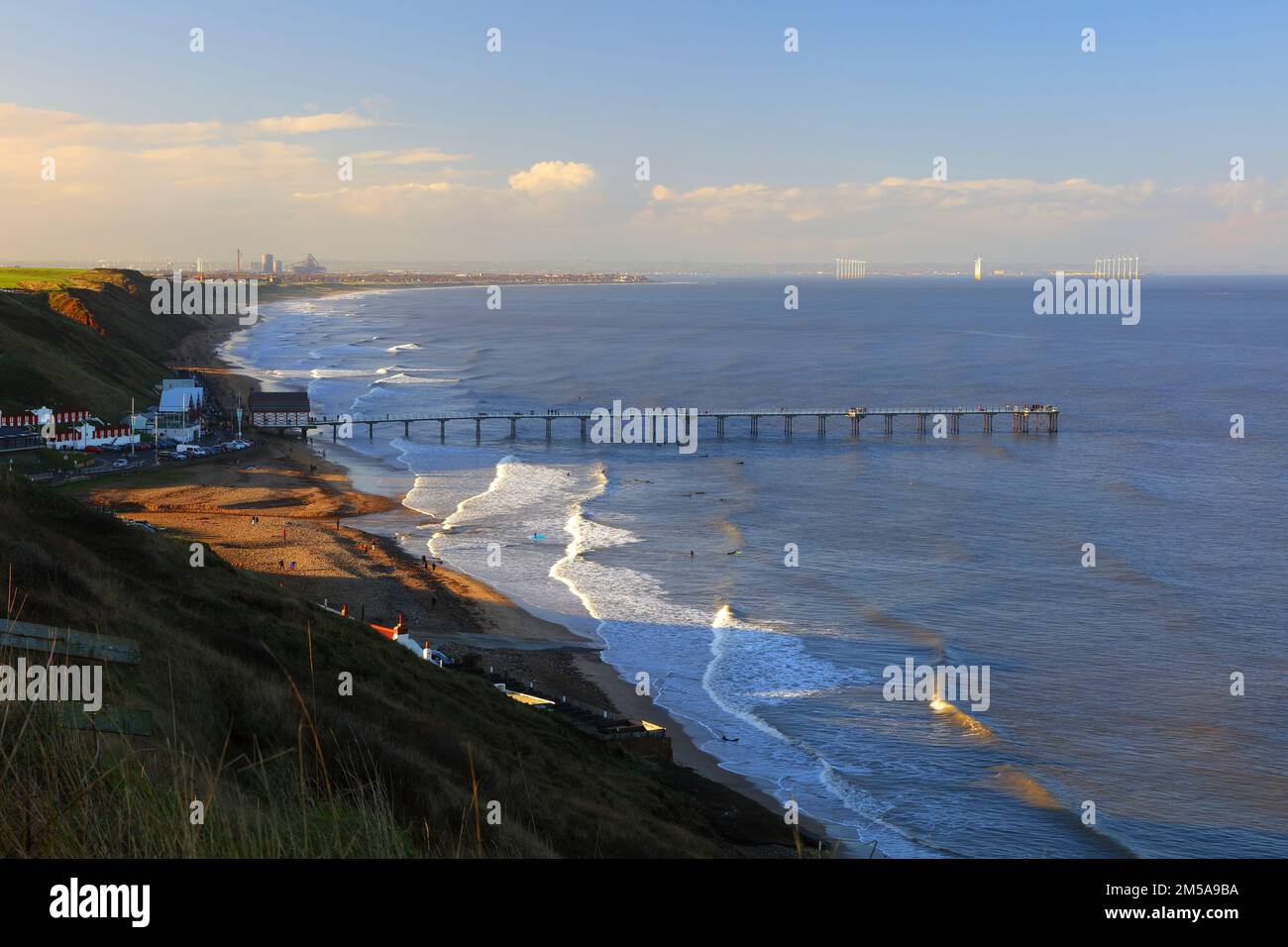 Landscape image of Saltburn on a sunny afternoon with lots of people ...