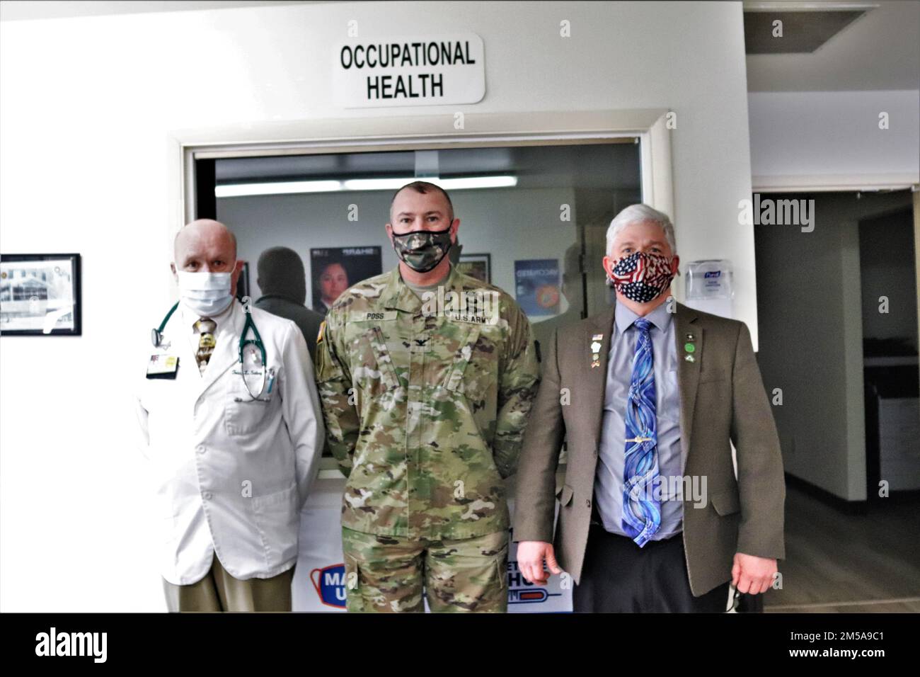 Garrison Commander Col. Michael Poss and Deputy to the Garrison ...