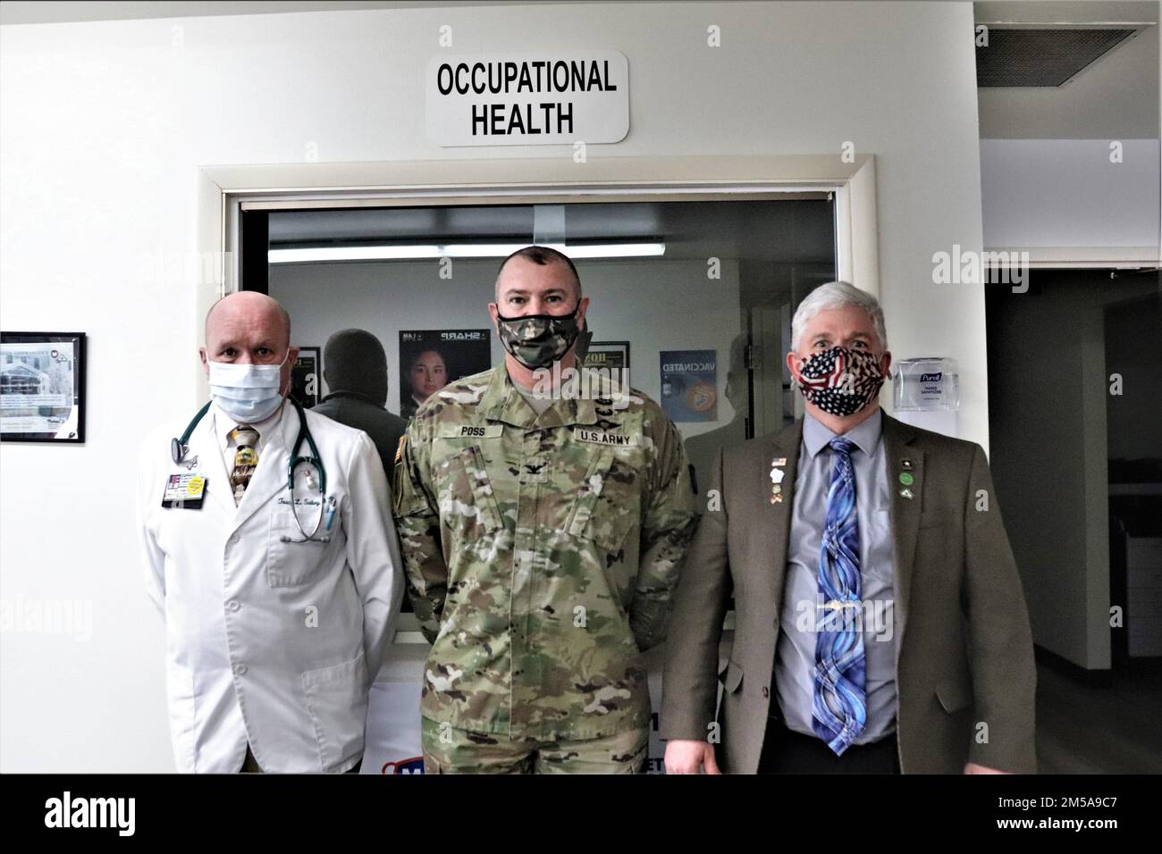 Garrison Commander Col. Michael Poss and Deputy to the Garrison ...