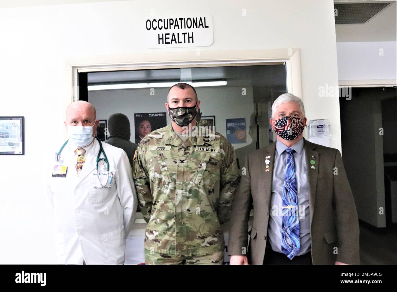 Garrison Commander Col. Michael Poss and Deputy to the Garrison ...