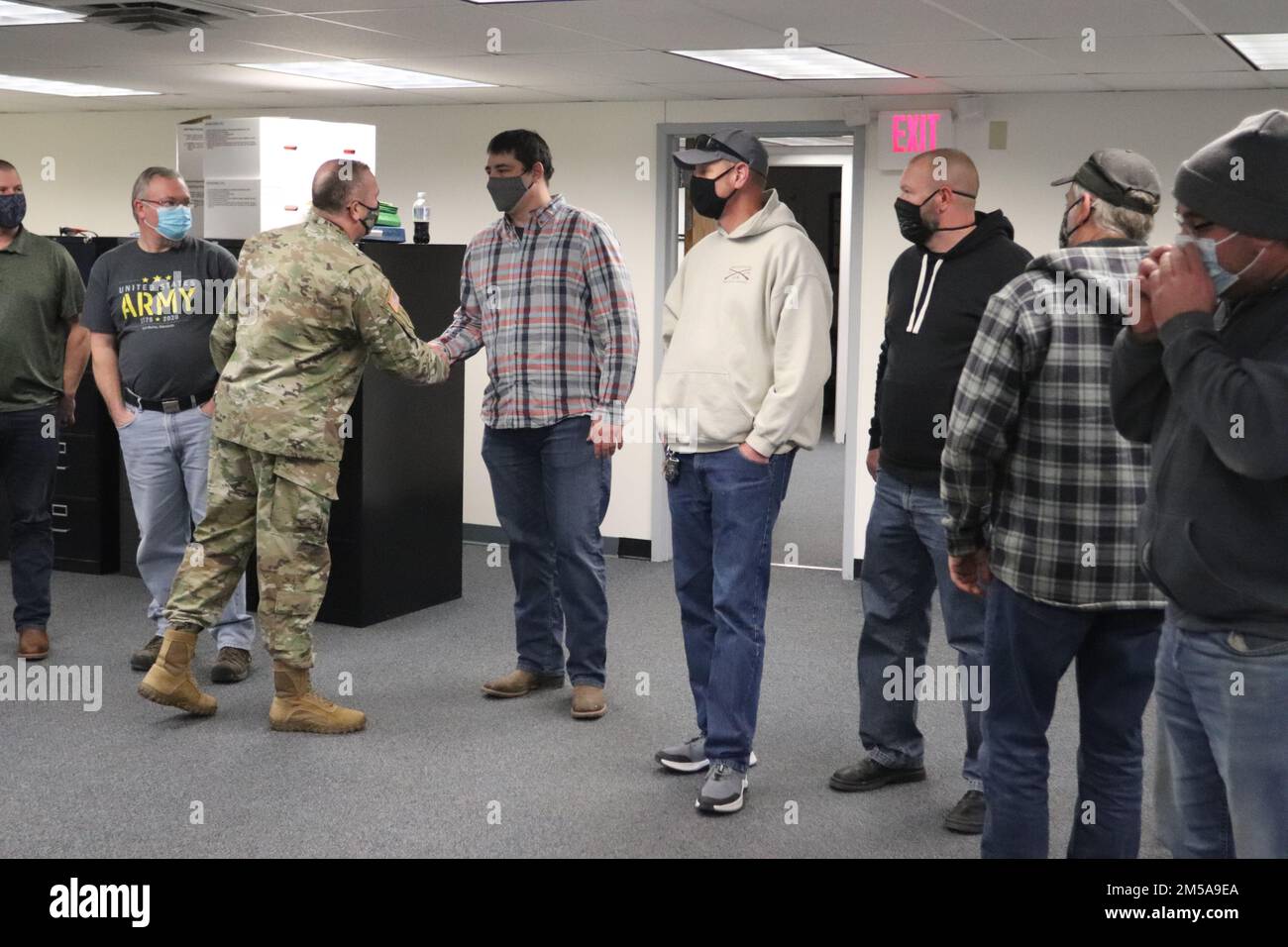 Garrison Commander Col. Michael Poss and Deputy to the Garrison ...