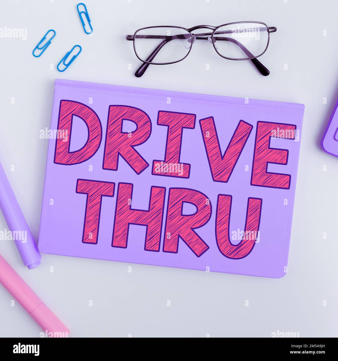 Hand writing sign Drive Thru. Conceptual photo place where you can get ...