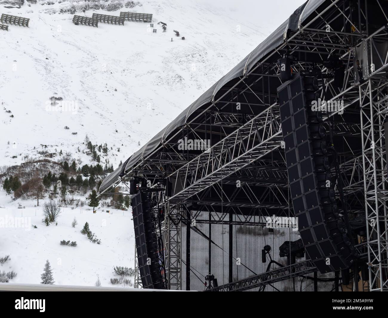 Stage equipment of an outdoor concert in the ski resort during winter ...