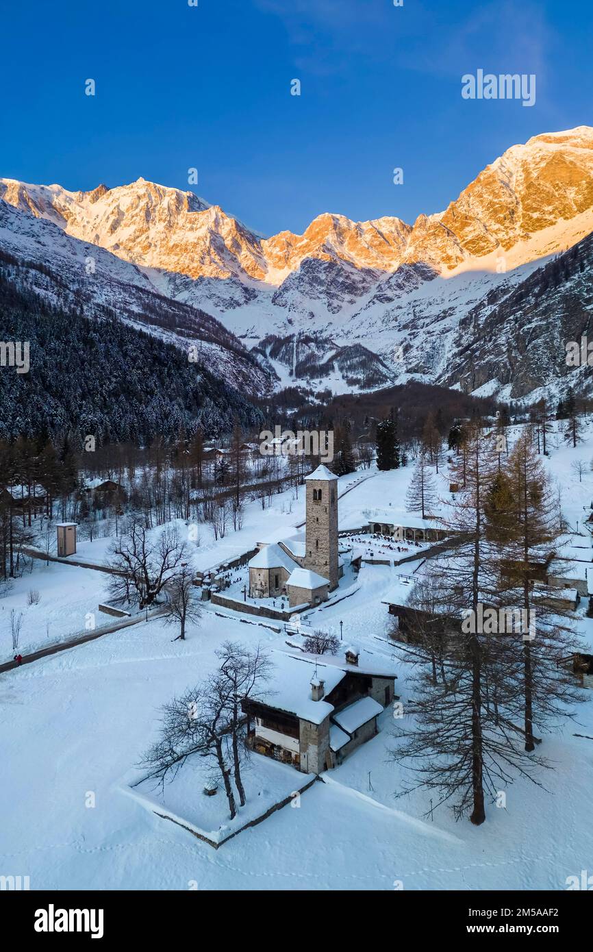 Sunrise in front of Monte Rosa from the old church of Macugnaga in ...
