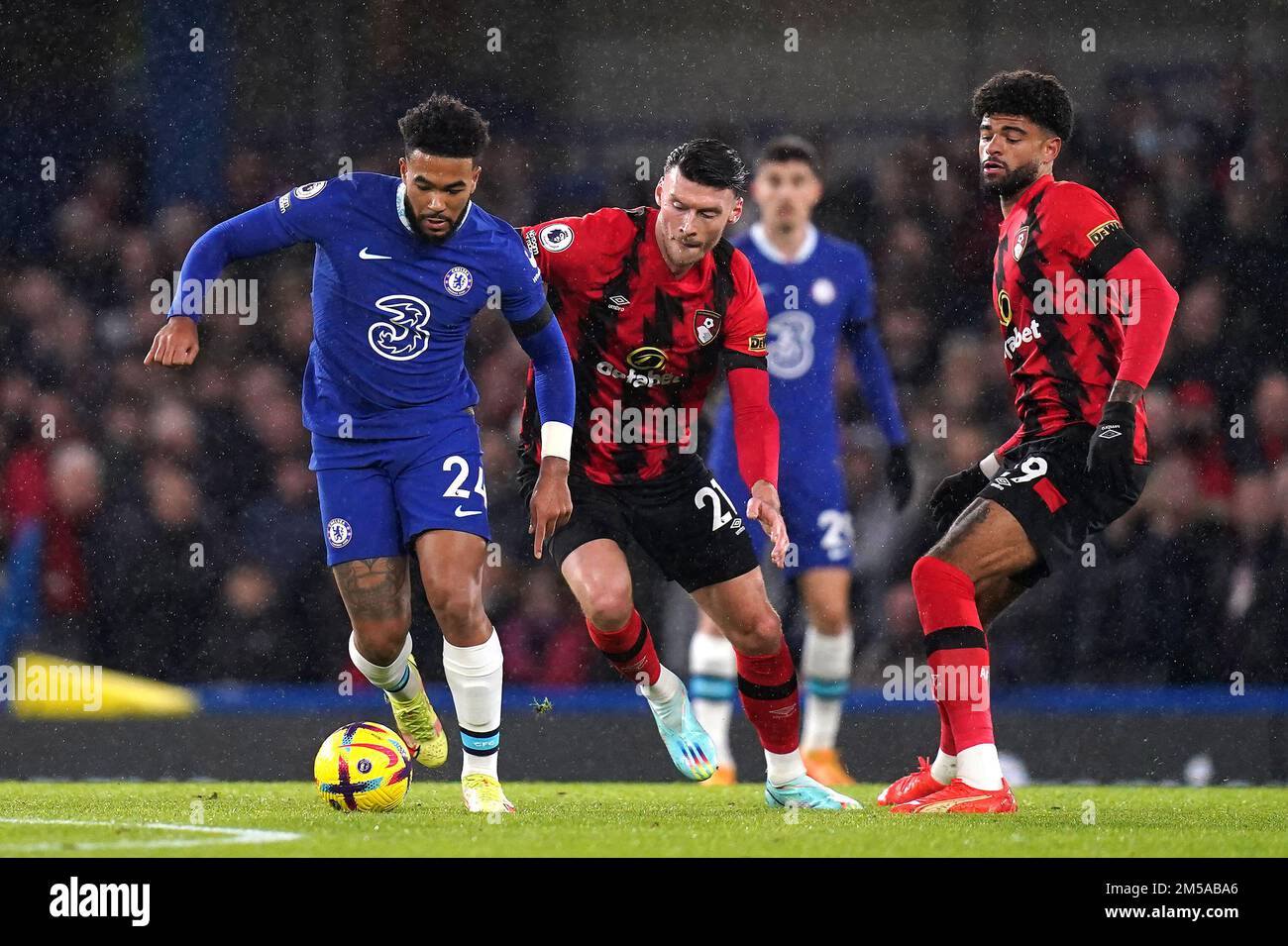 Chelsea's Reece James (left) battles for the ball with Bournemouth's ...