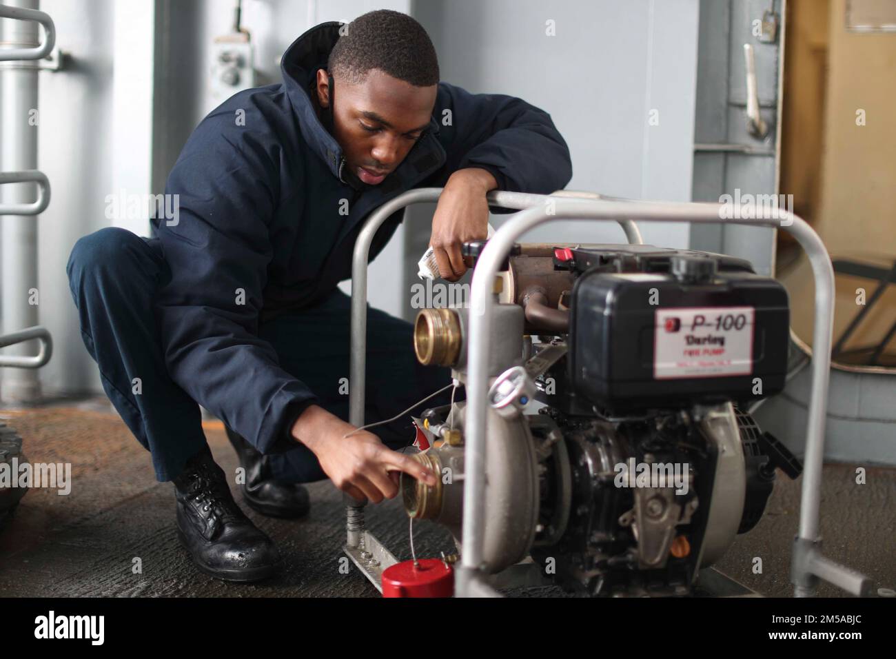 220215-N-TT639-1079 PACIFIC OCEAN (Feb. 15, 2022) – Fireman Alexander ...