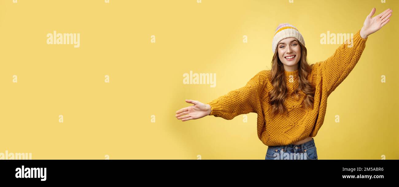 Friendly happy charming smiling cute girl inviting friends joyfully ...
