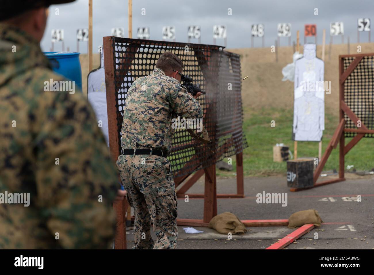 U.S. Marine Gunnery Sgt. Daniel Rhodes, a marksmanship instructor with ...