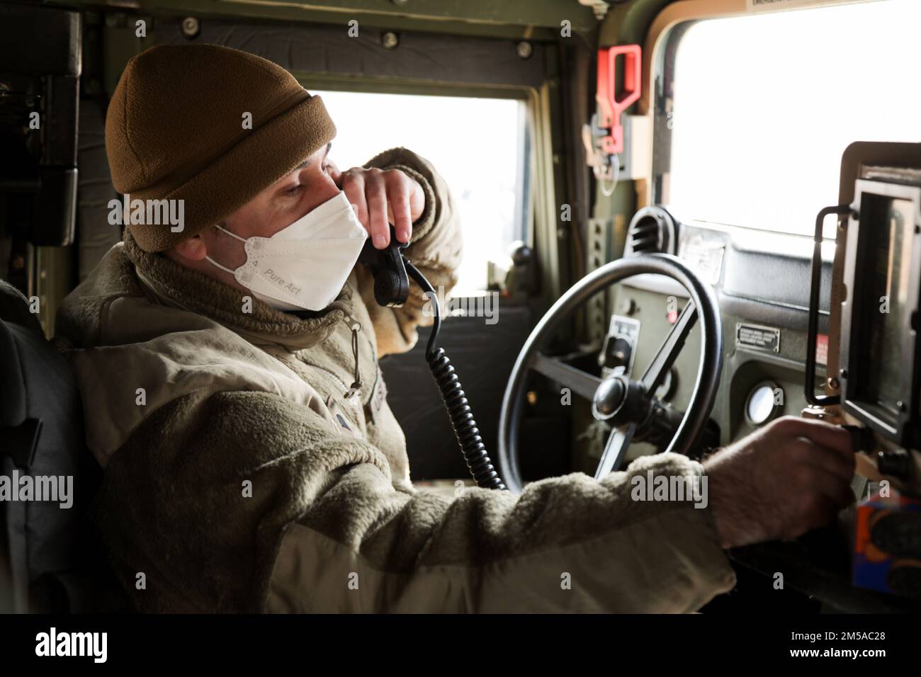 Spc. Brandon Perkins, an air traffic control operator attached to ...