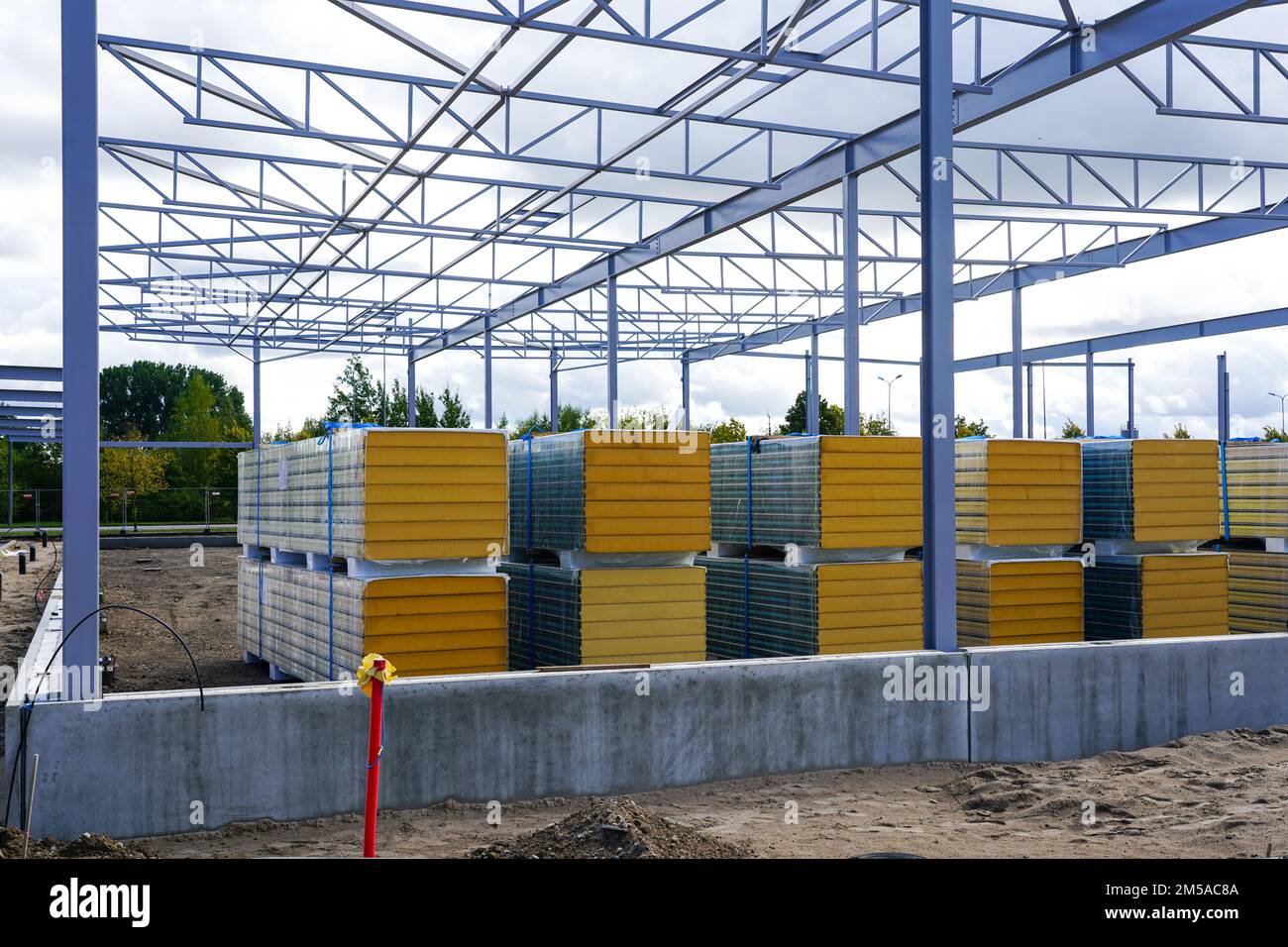 Steel structure framework building and stacks of sandwich panels for ...