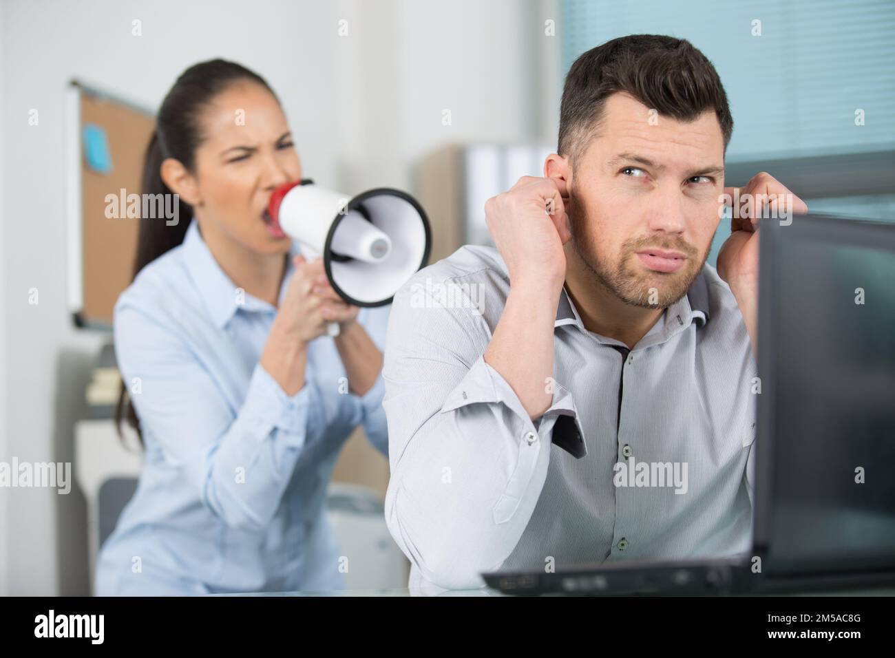 angry woman shouting against man Stock Photo - Alamy