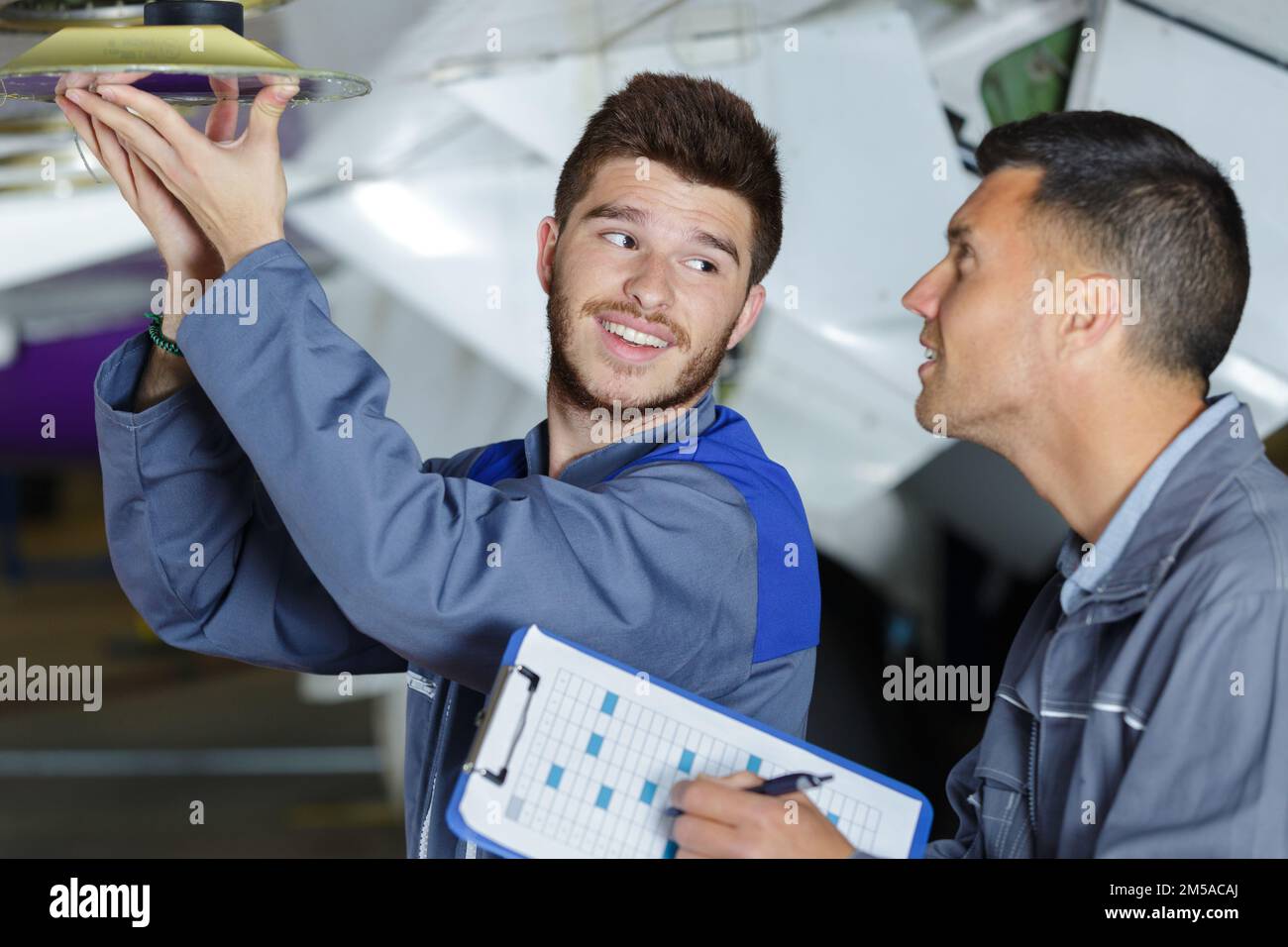 engineer checks the sound system of an airplane Stock Photo - Alamy