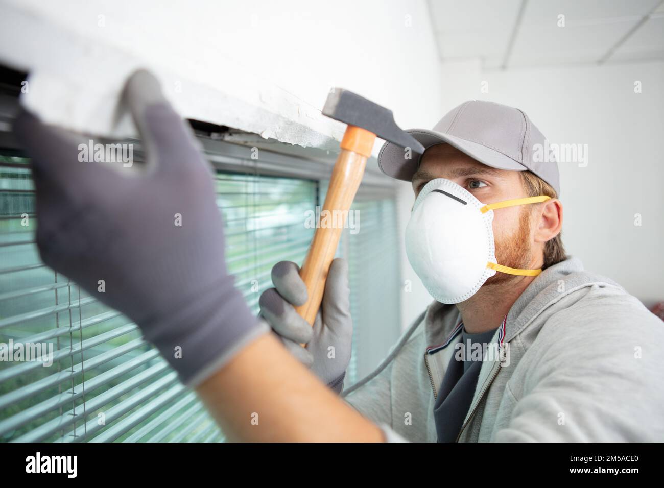 window replacement installation by professiona construction worker ...