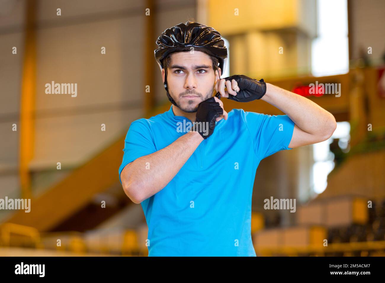 biker putting his helmet on Stock Photo - Alamy