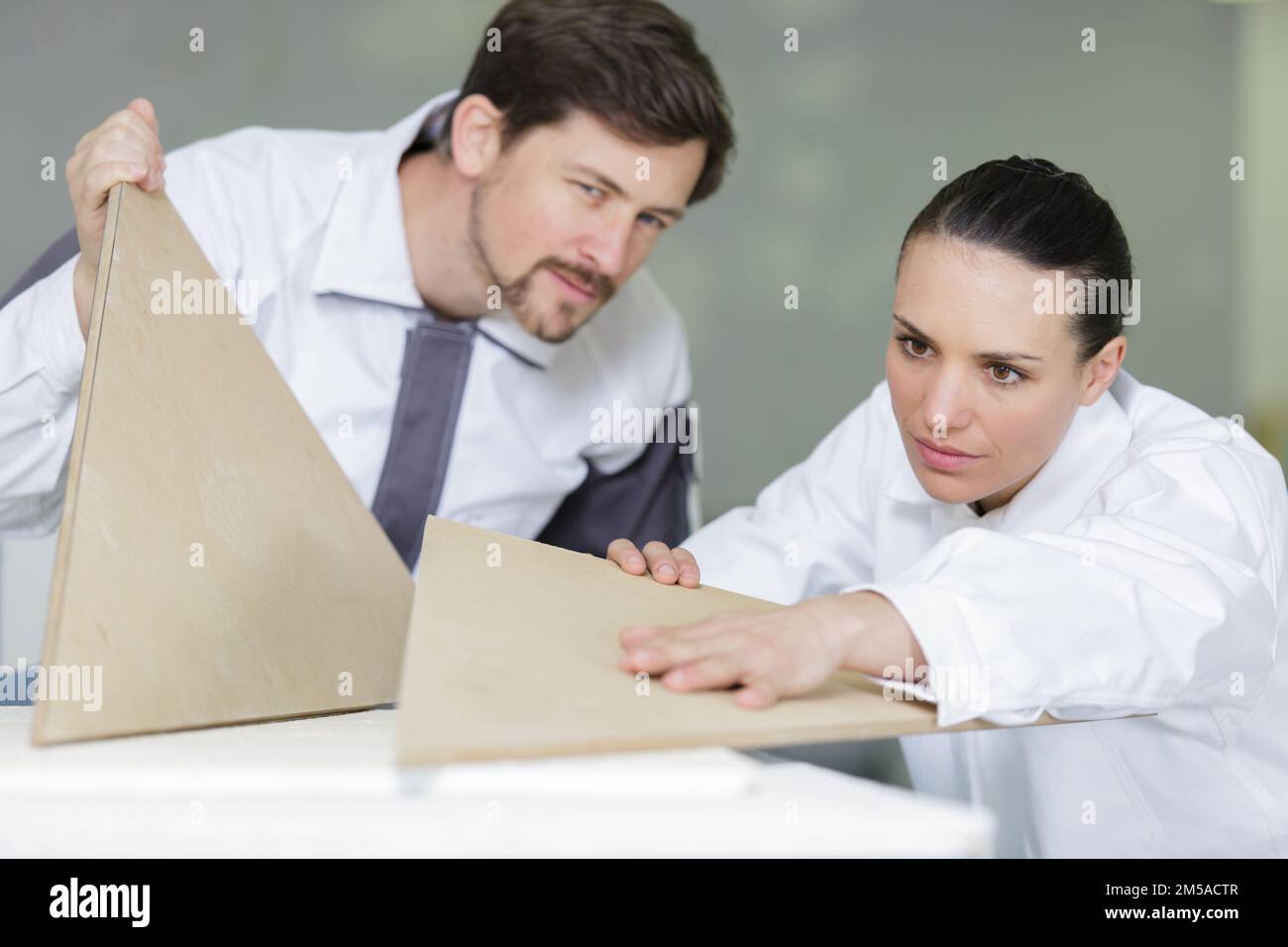 Male carpenter cutting wooden boards hi-res stock photography and ...