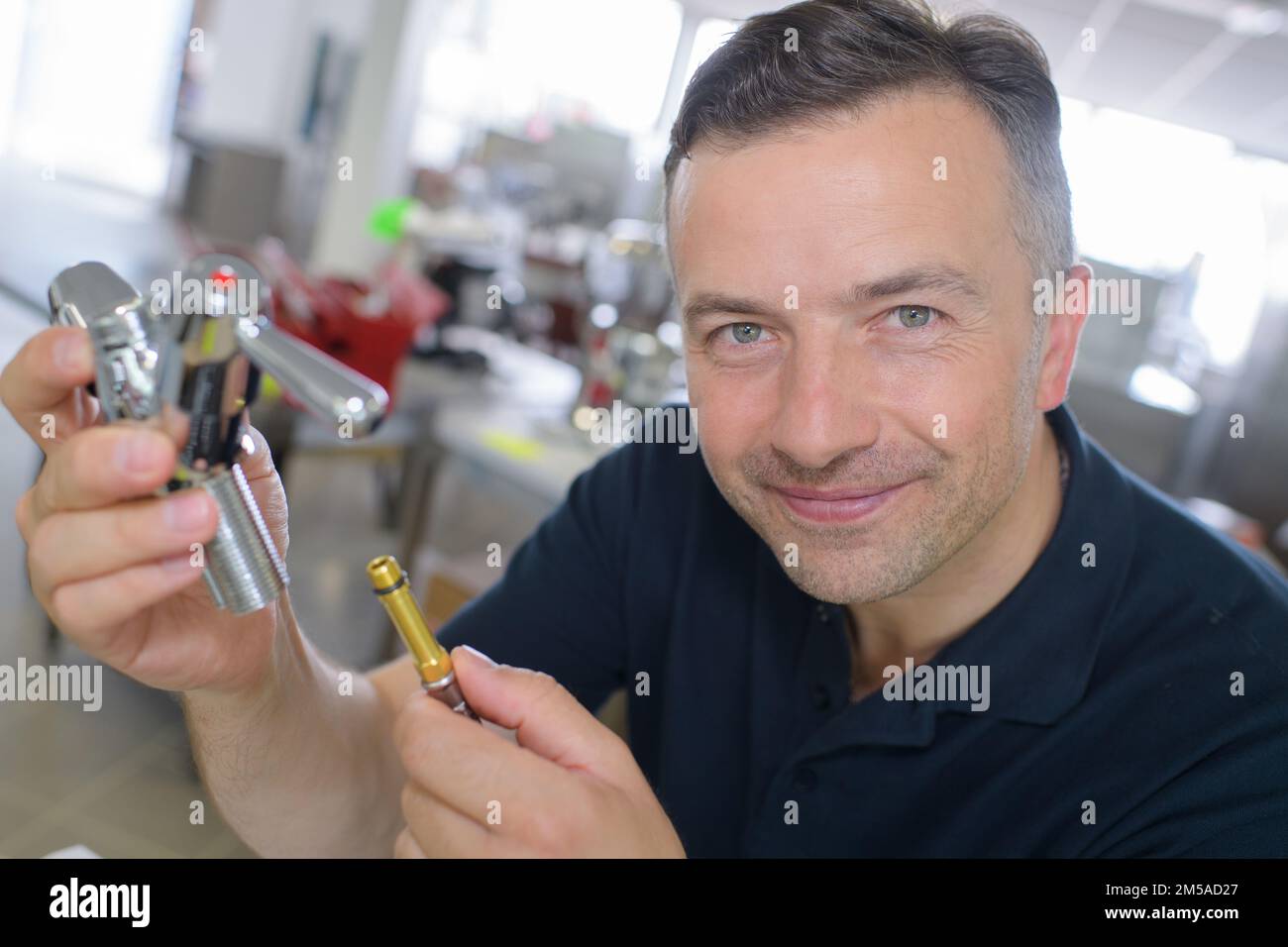portrait of a happy male plumber Stock Photo - Alamy