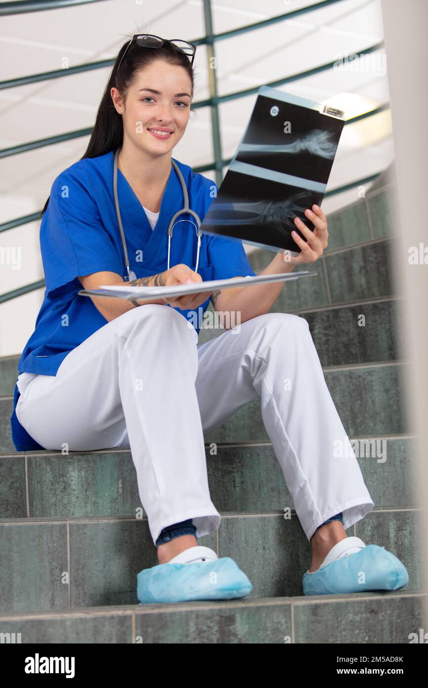 Nurse walking down steps hi-res stock photography and images - Alamy