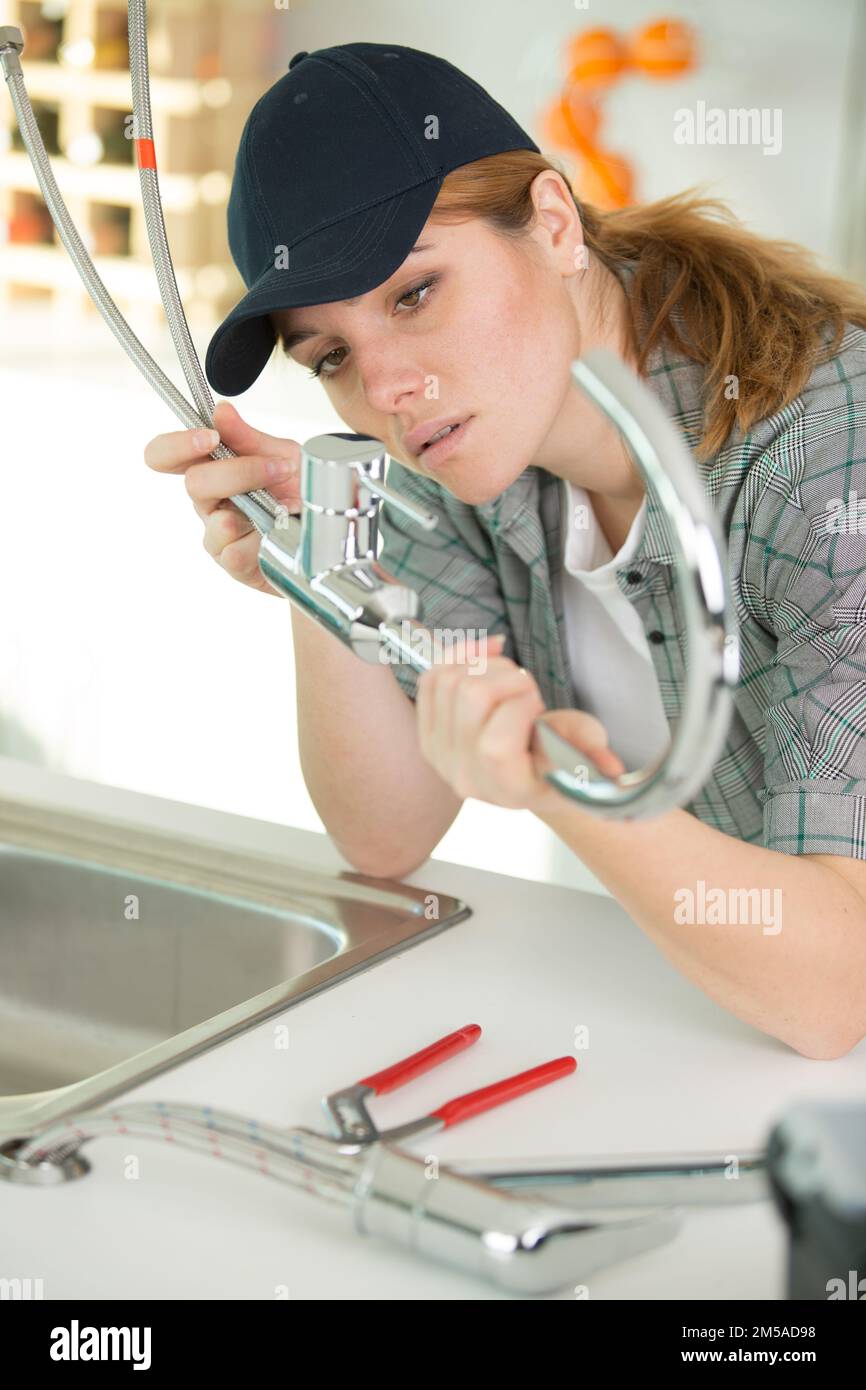 Installing new tap hi-res stock photography and images - Alamy