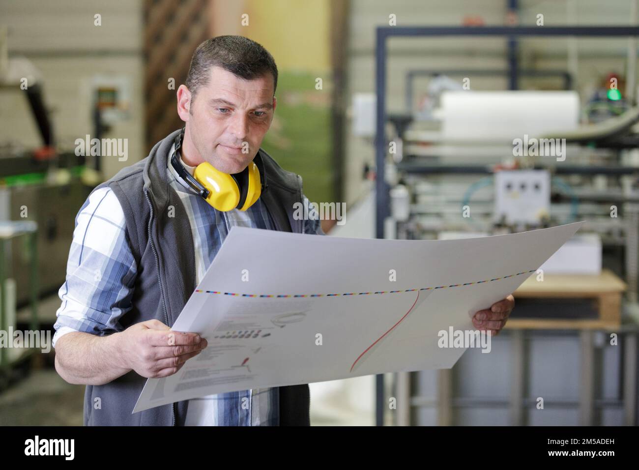 engineer man working checking the plans Stock Photo - Alamy