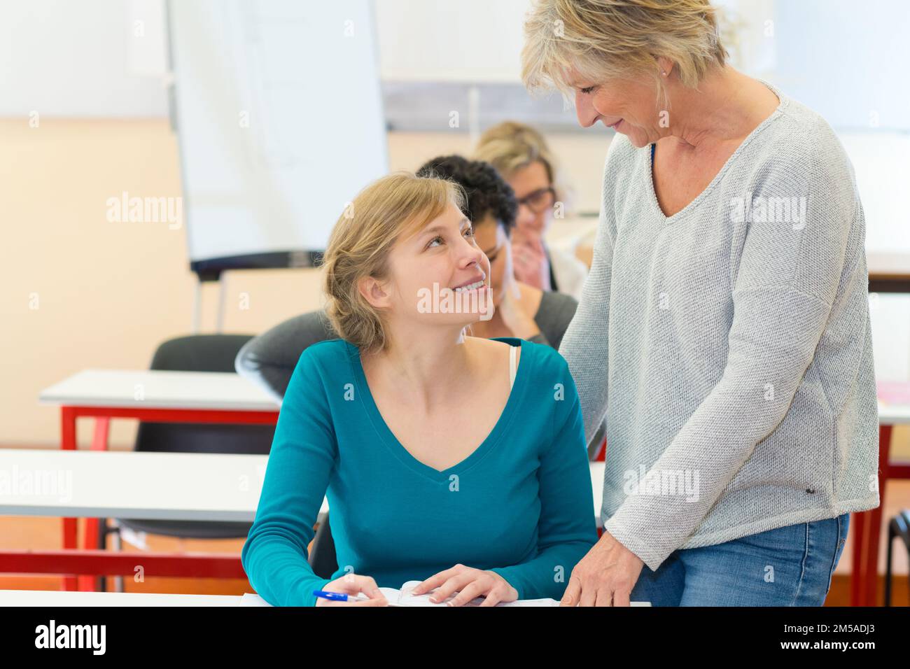 portrait of student in classroom Stock Photo - Alamy