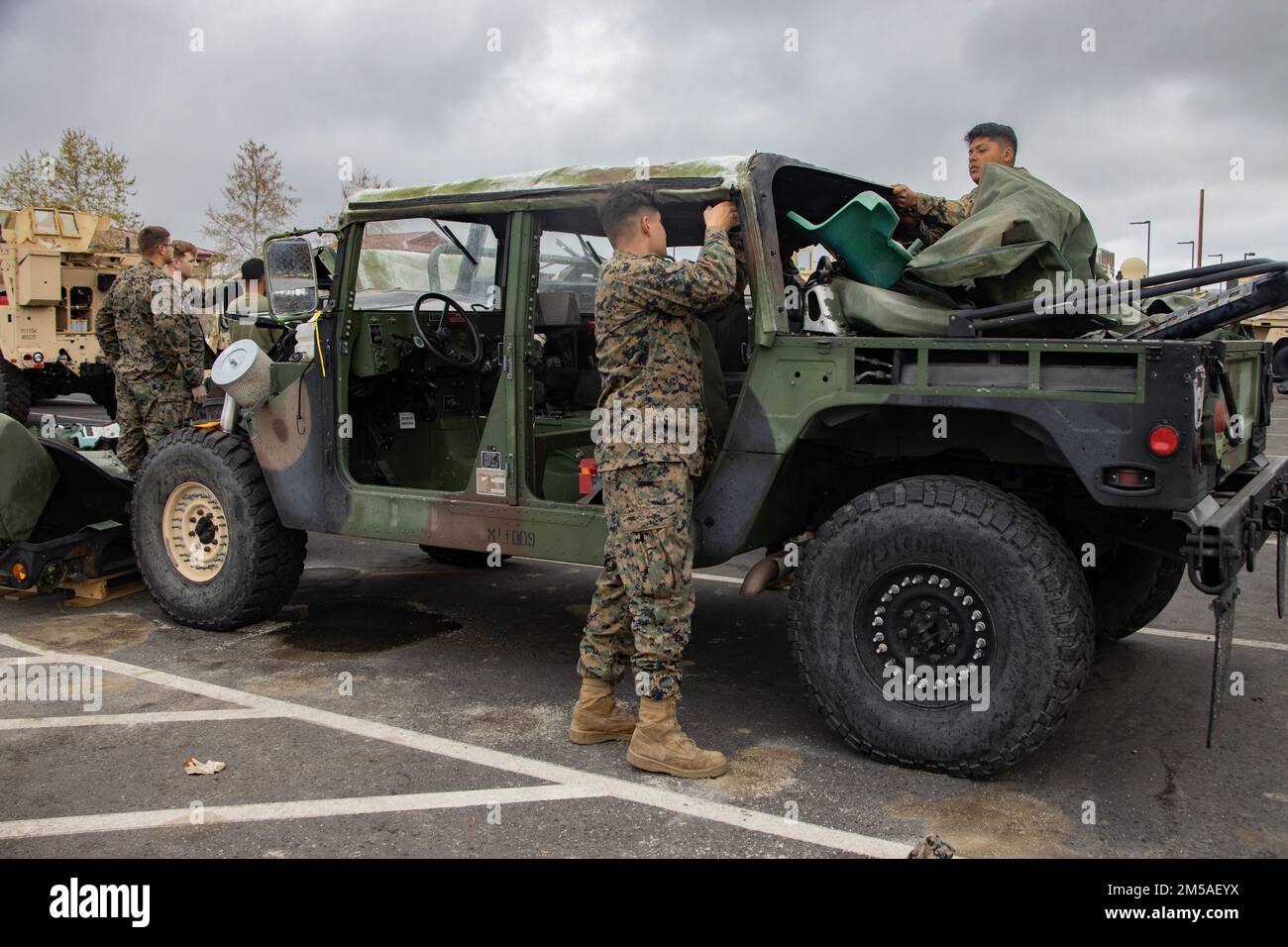 U.S. Marines with 5th Marine Regiment, 1st Marine Division, reassemble ...
