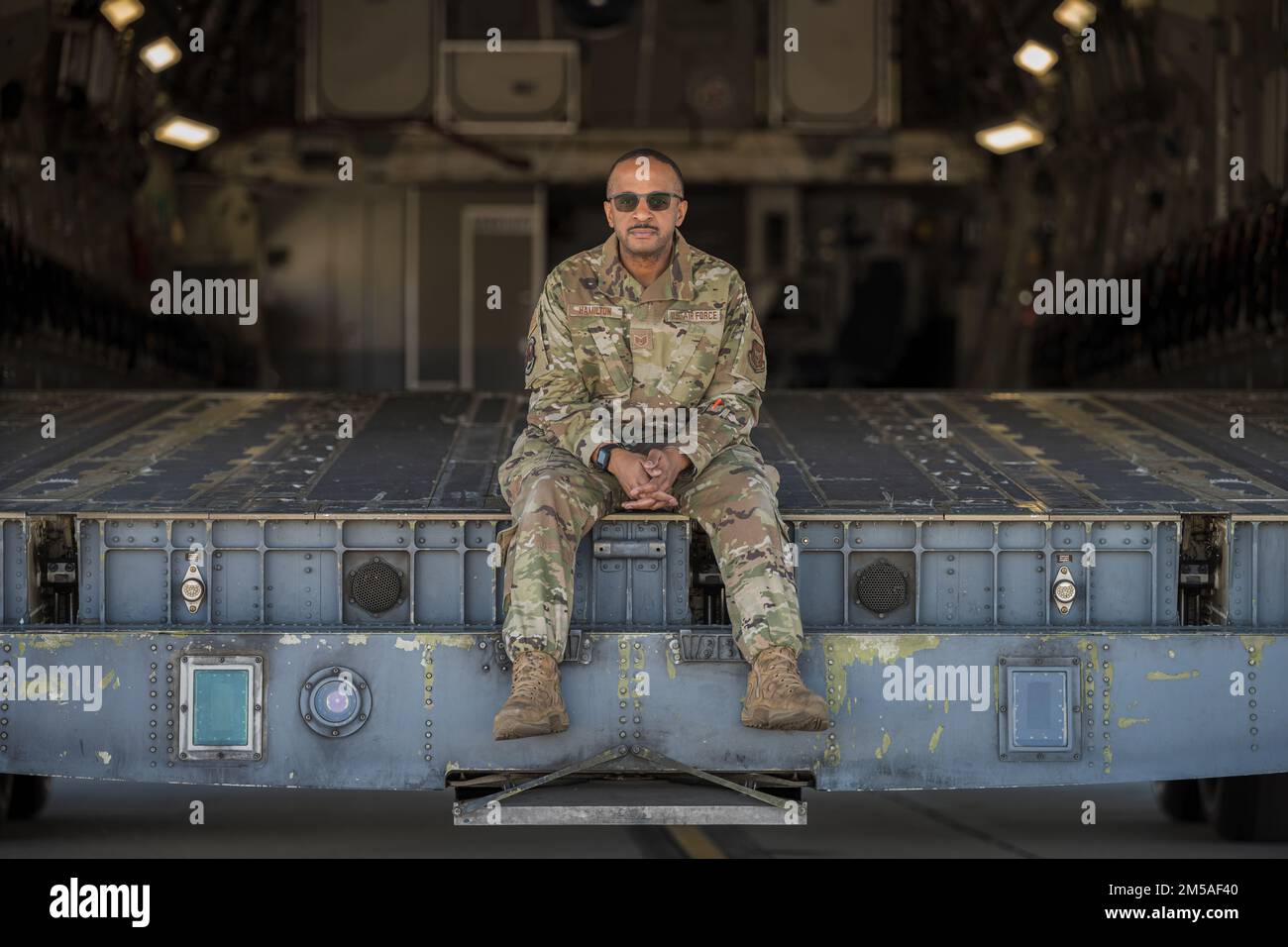 Dedicated Crew Chief TSgt Hailton sits on the ramp of his C-17 ...
