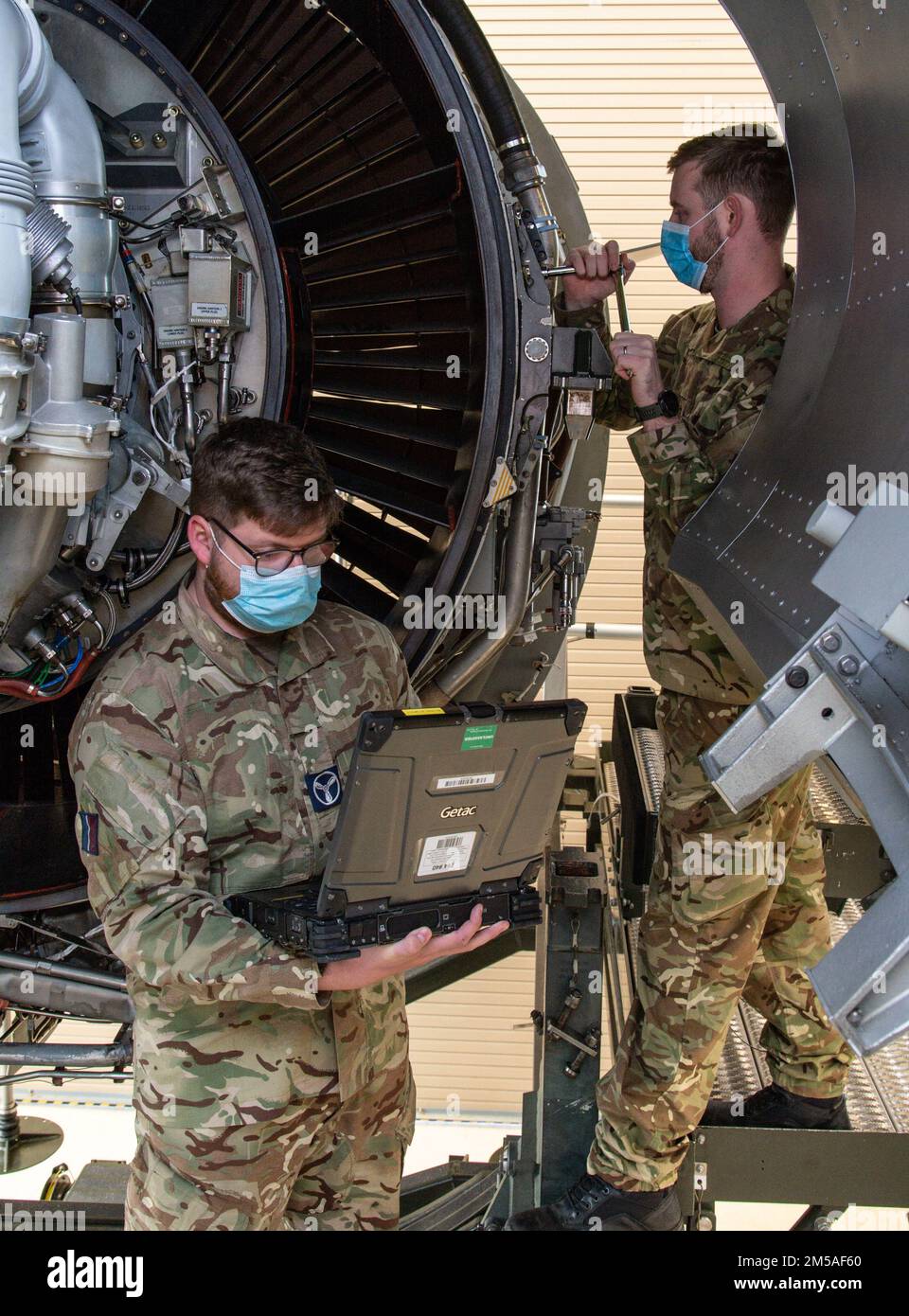 Royal Air Force Senior Aircraftman Technician Joseph Eastham, reads ...
