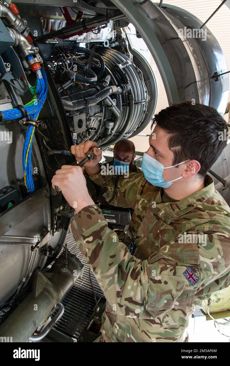 Royal Air Force Senior Aircraftman Technician William King removes a ...