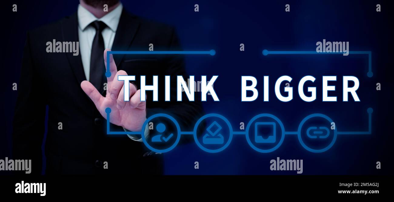 Sign displaying Think Bigger. Word Written on being able to dream and ...