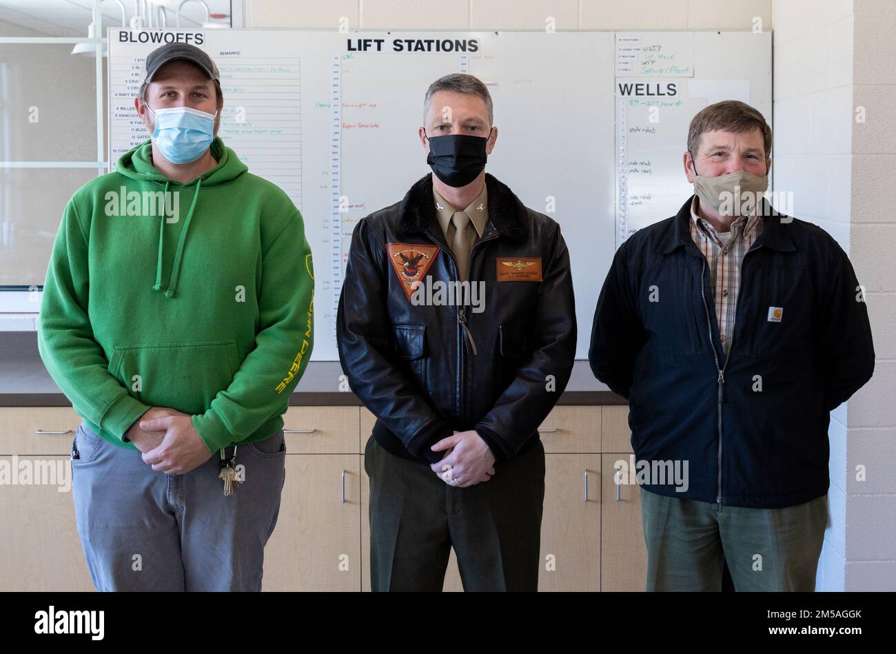 Timothy Bert, a utility systems operator work leader, and Michael ...