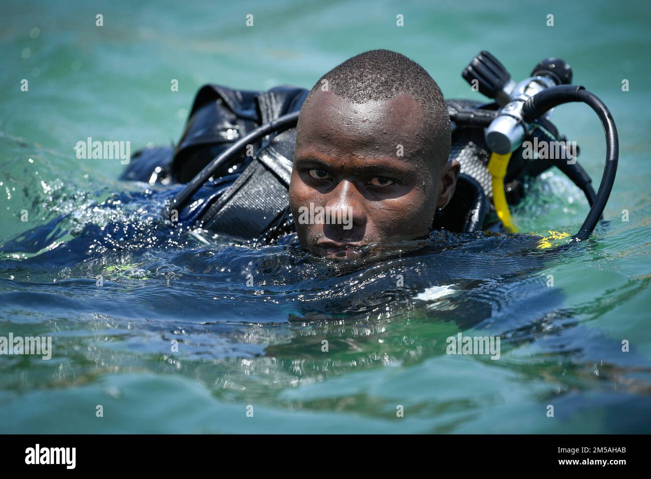 MOMBASA, Kenya (Feb. 16, 2022) Kenyan diver Anthony Macharia conducts ...