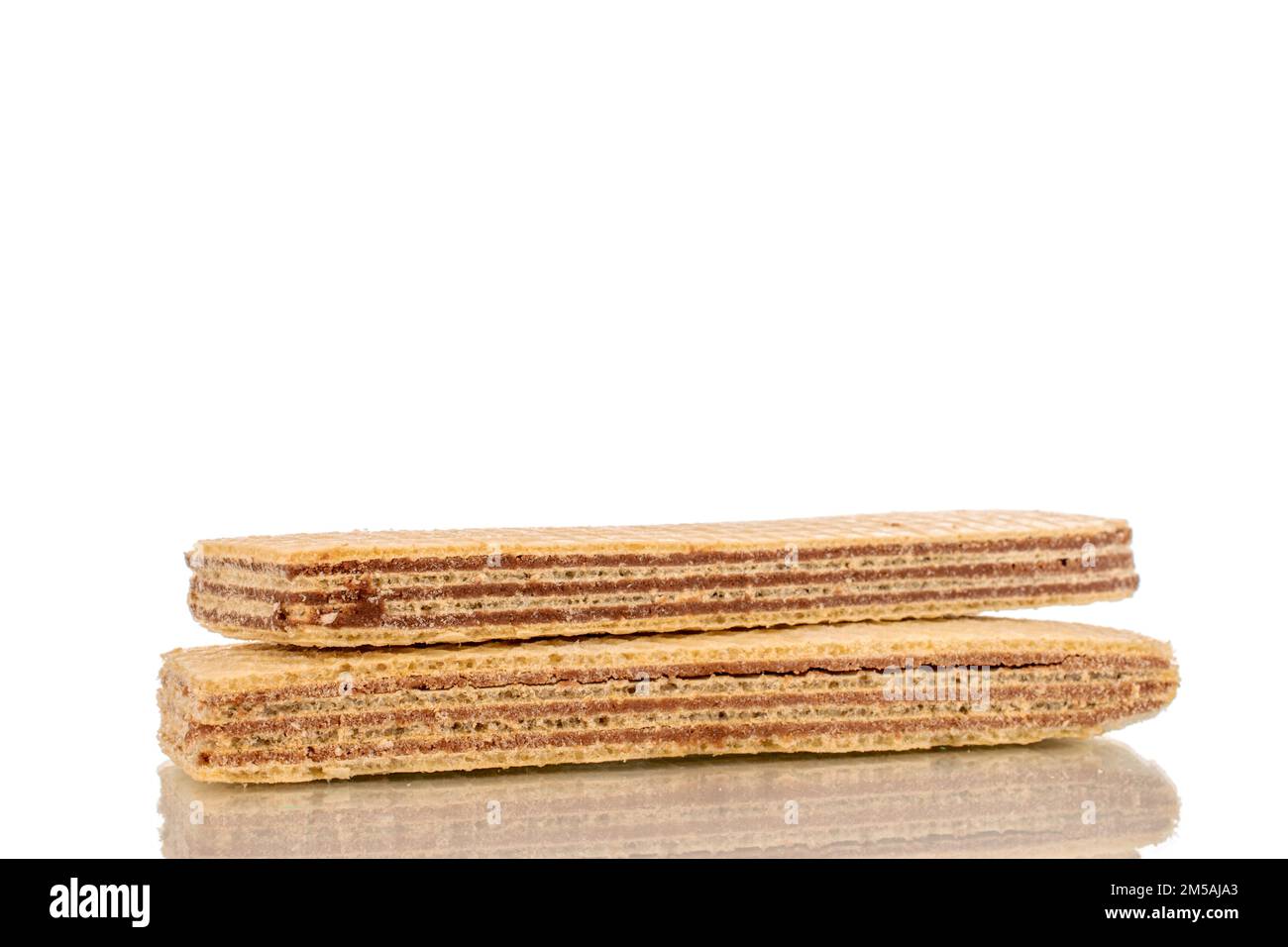 Two sweet chocolate wafers, close-up, isolated on white background ...