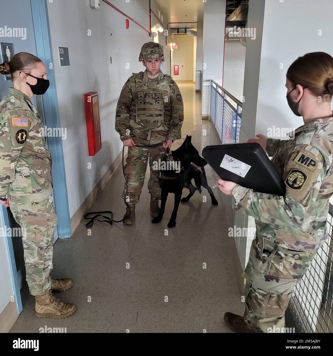 Pfc. Talon Bush, with the 8th Military Police Detachment, receives ...