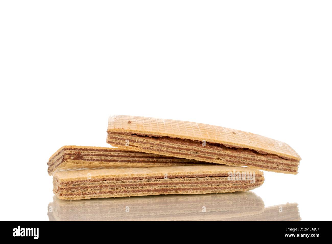 Three sweet chocolate wafers, close-up, isolated on white background ...
