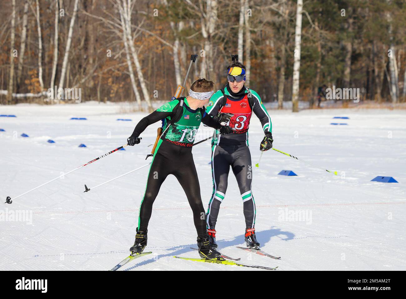 Joshua Barrow (r) tags off Brendan Thompson for their second leg of the ...
