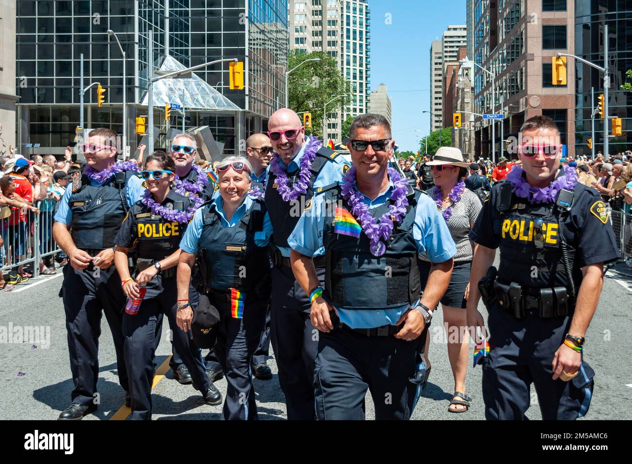 Members of the police march in the parade wearing their uniforms Stock ...