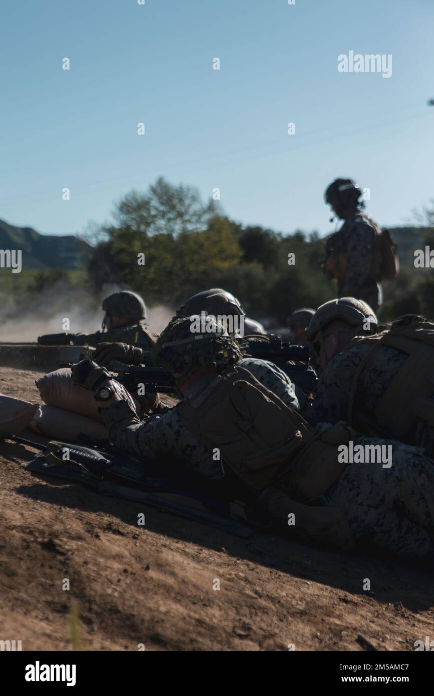 U.S. Marines with the Advanced Machine-Gun Course, fire an M240G medium ...