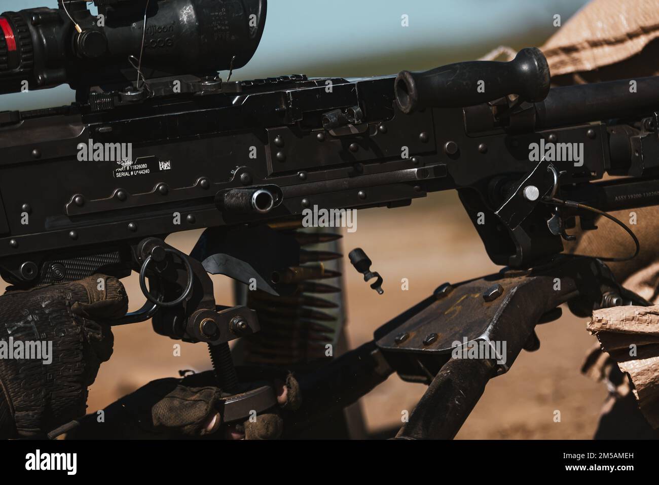 A U.S. Marine with the Advanced Machine-Gun Course fires a M240G medium ...
