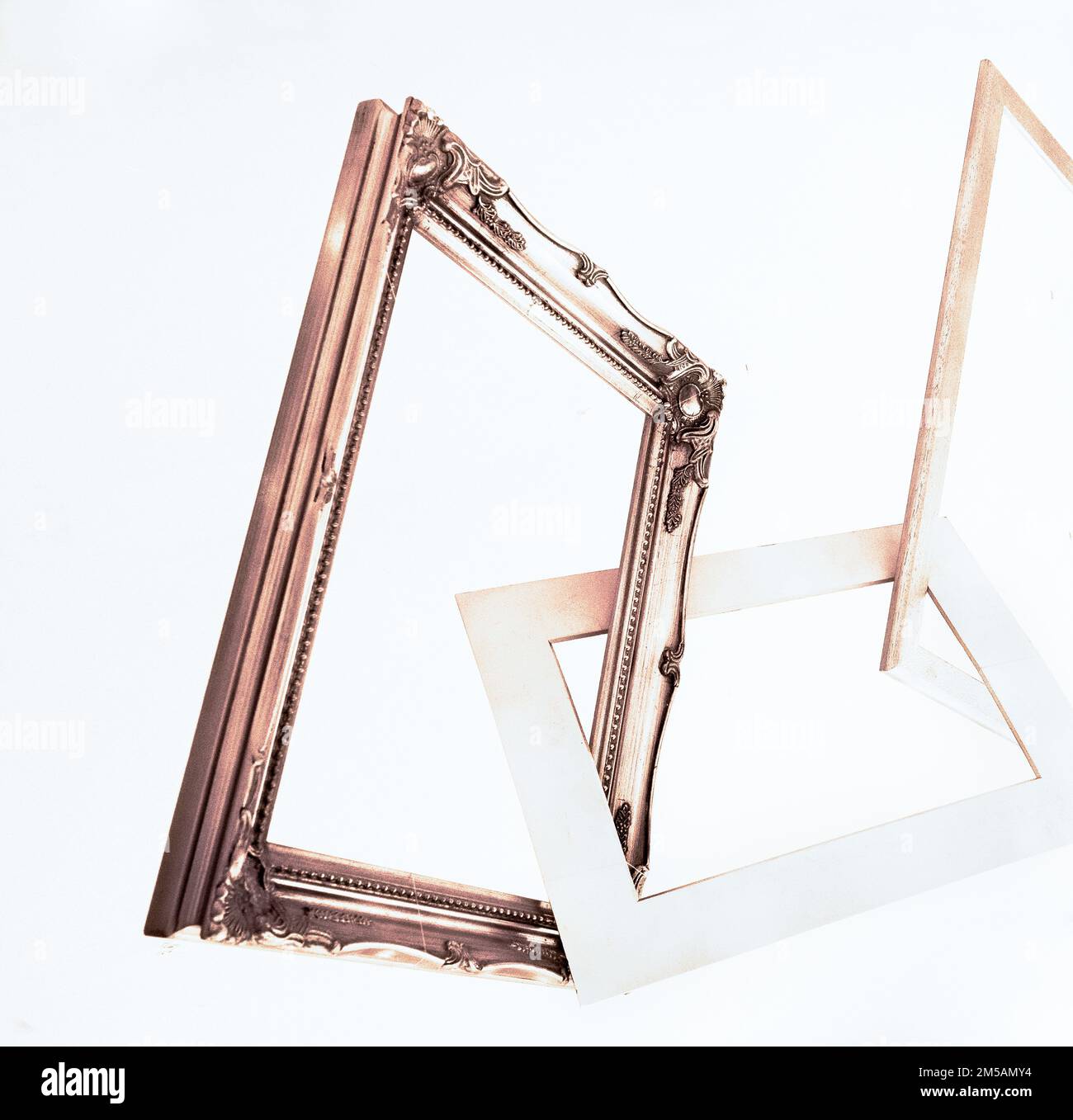 The Interlinked picture frames isolated on white background Stock Photo ...