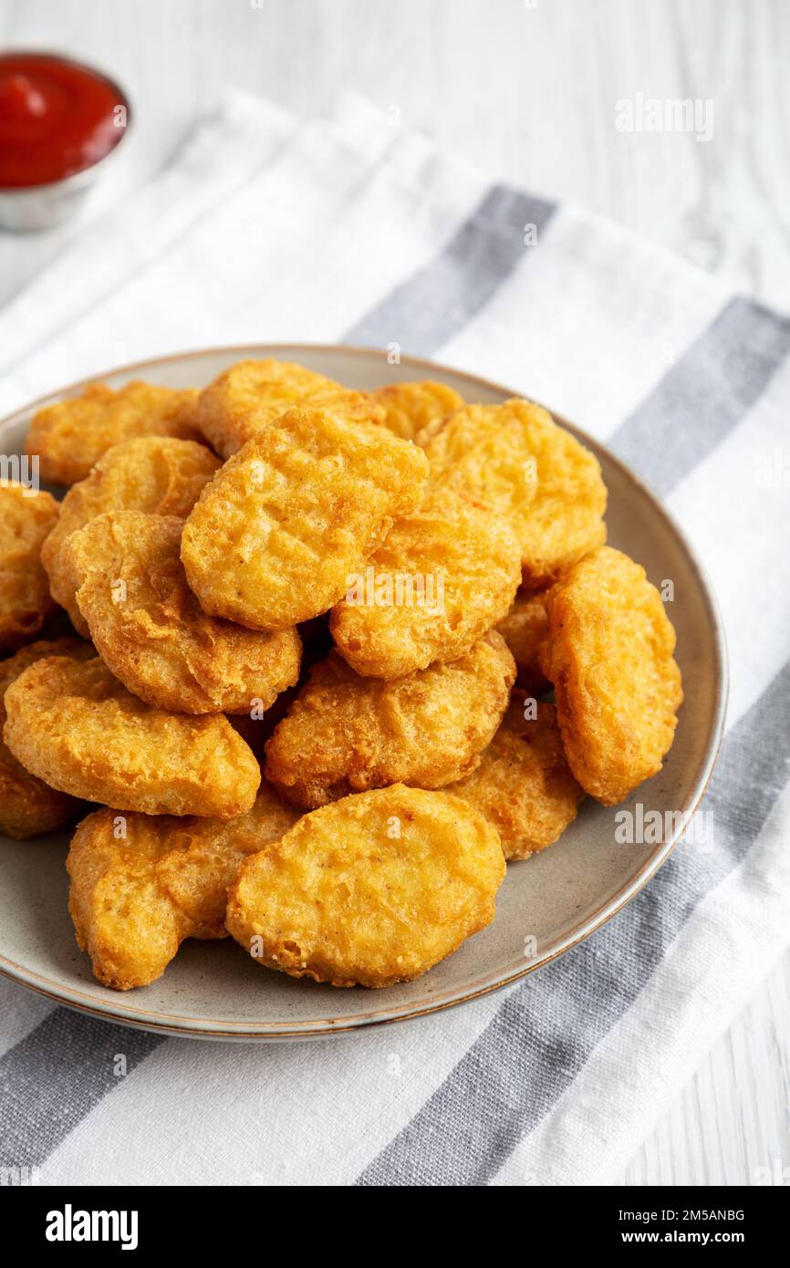 Homemade Chicken Nuggets with Ketchup, side view Stock Photo - Alamy