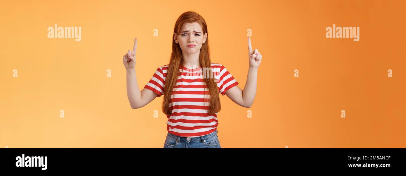 Disappointed upset cute whining timid redhead girl, gloomy face ...