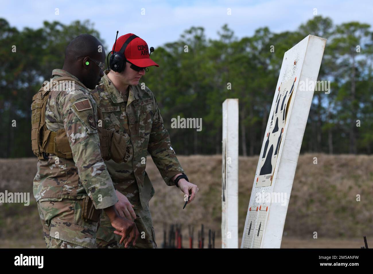 U.S. Air Force Staff Sgt. Michael Gaither, left, and Senior Airman ...