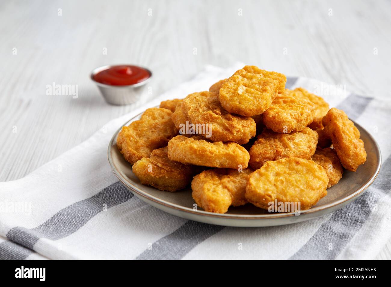 Homemade Chicken Nuggets with Ketchup, low angle view. Space for text ...
