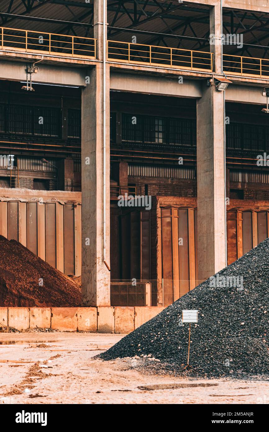 A vertical footage of a construction with a pillars in the middle and ...