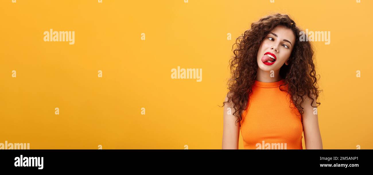 Girl fooling around carefree feeling bored trying amuse herself during ...