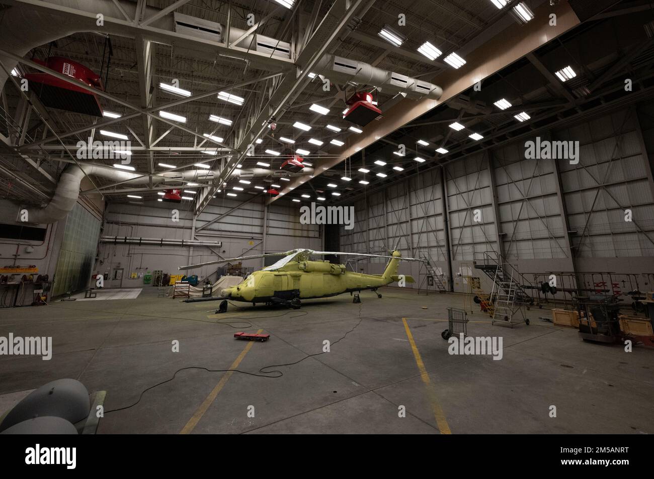An MH-60G Pave Hawk Helicopter waits to be primed and painted in the ...