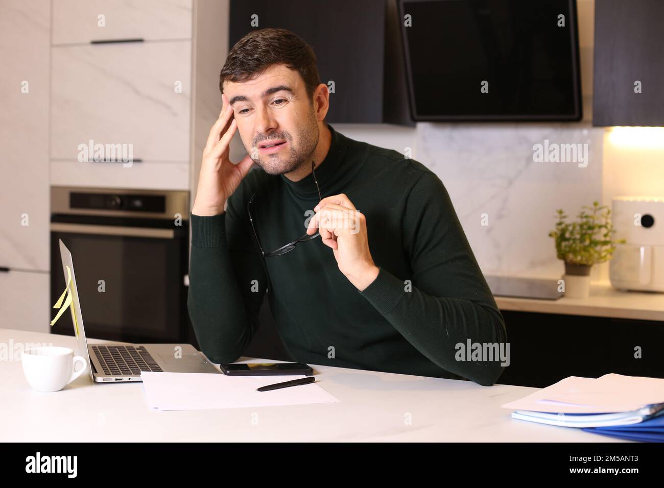 Tired worker suffering vision issues Stock Photo - Alamy