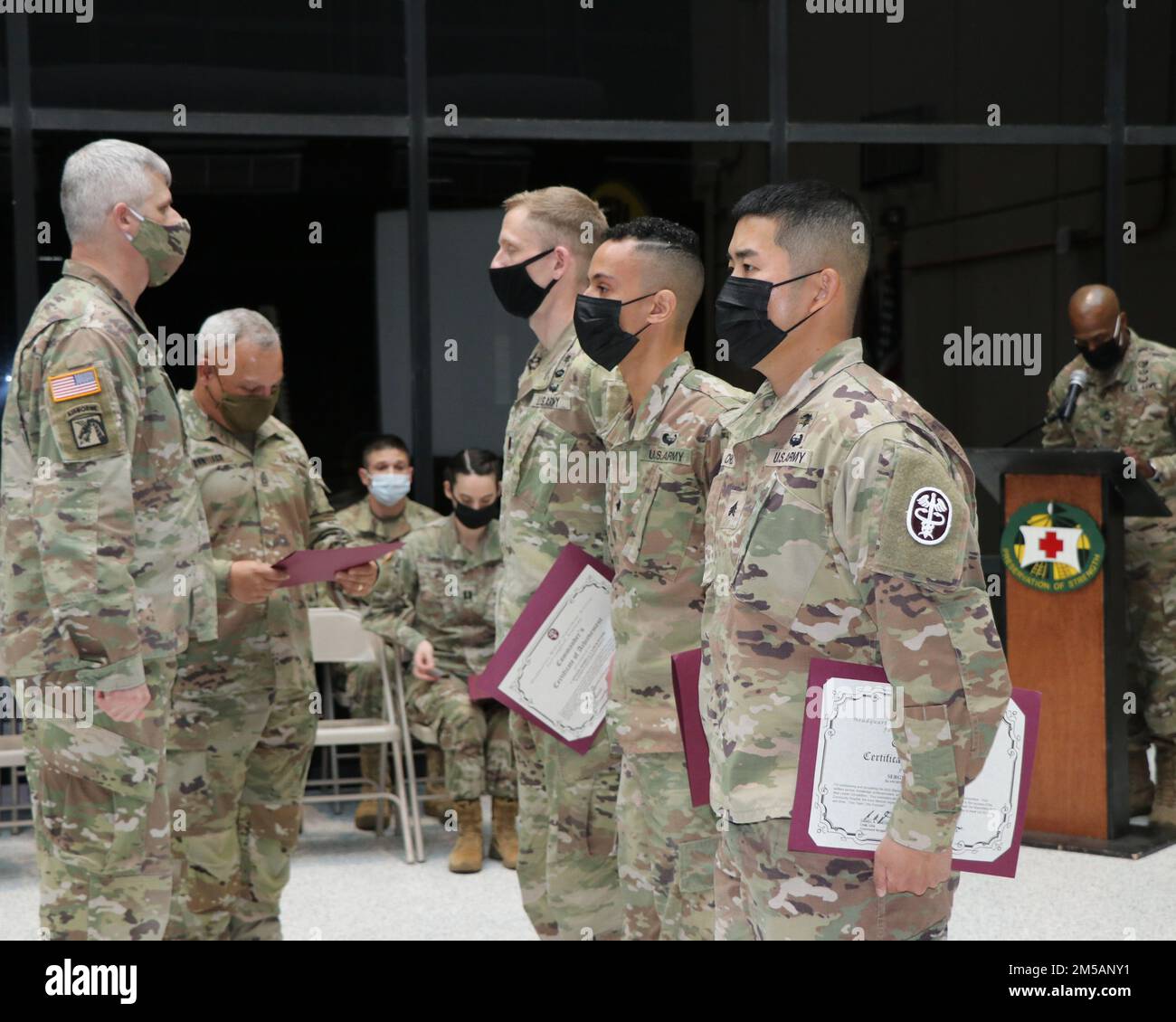 From left, Col. Vincent B. Myers and Command Sgt. Maj. Daniel Santiago ...