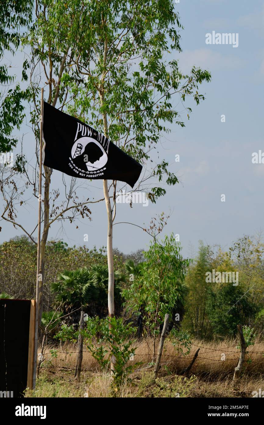 The National League of Families POW/MIA flag flies on site during a ...