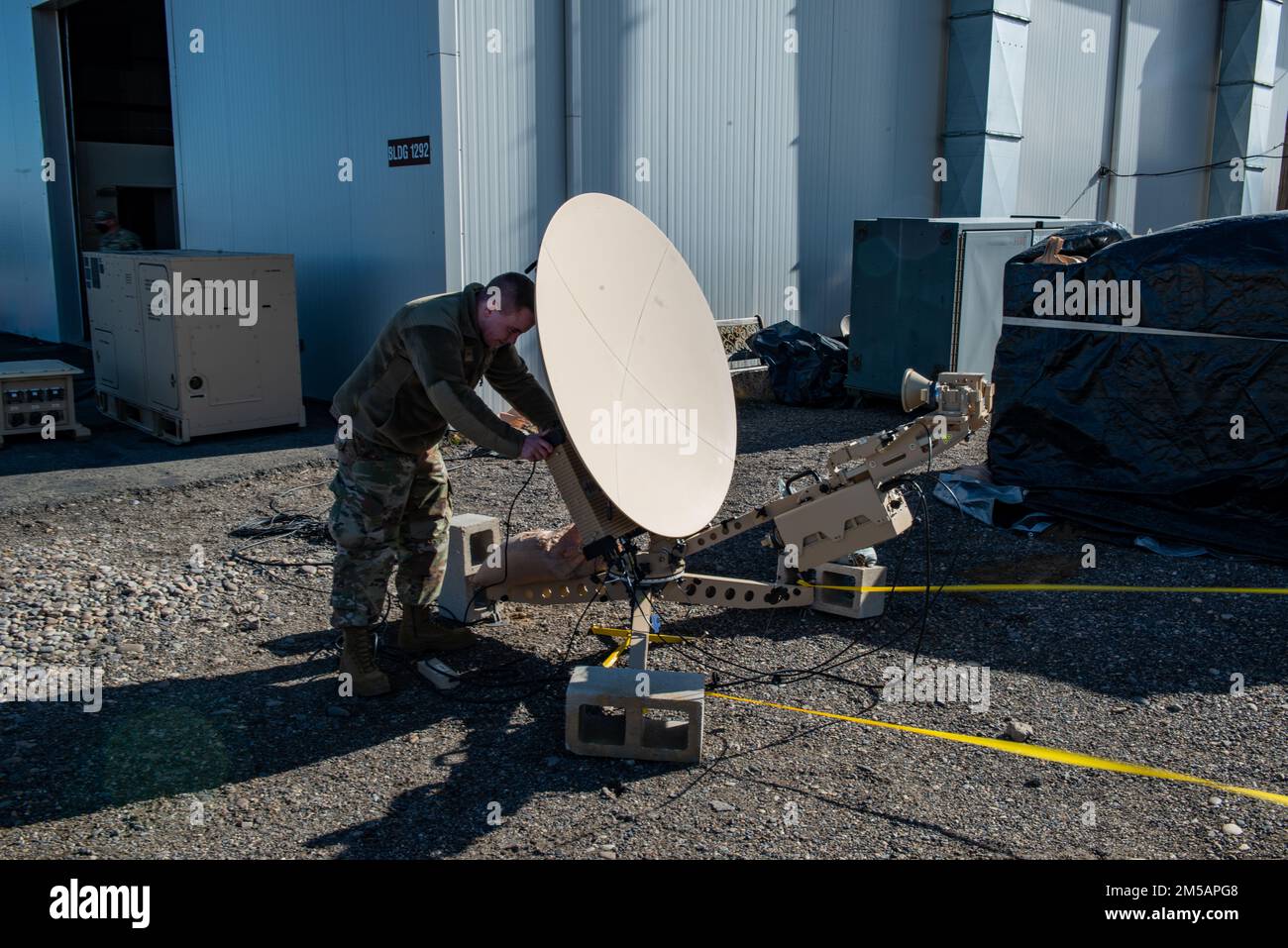 A U.S. Air Force Airman, assigned to the 242nd Combat Communications ...